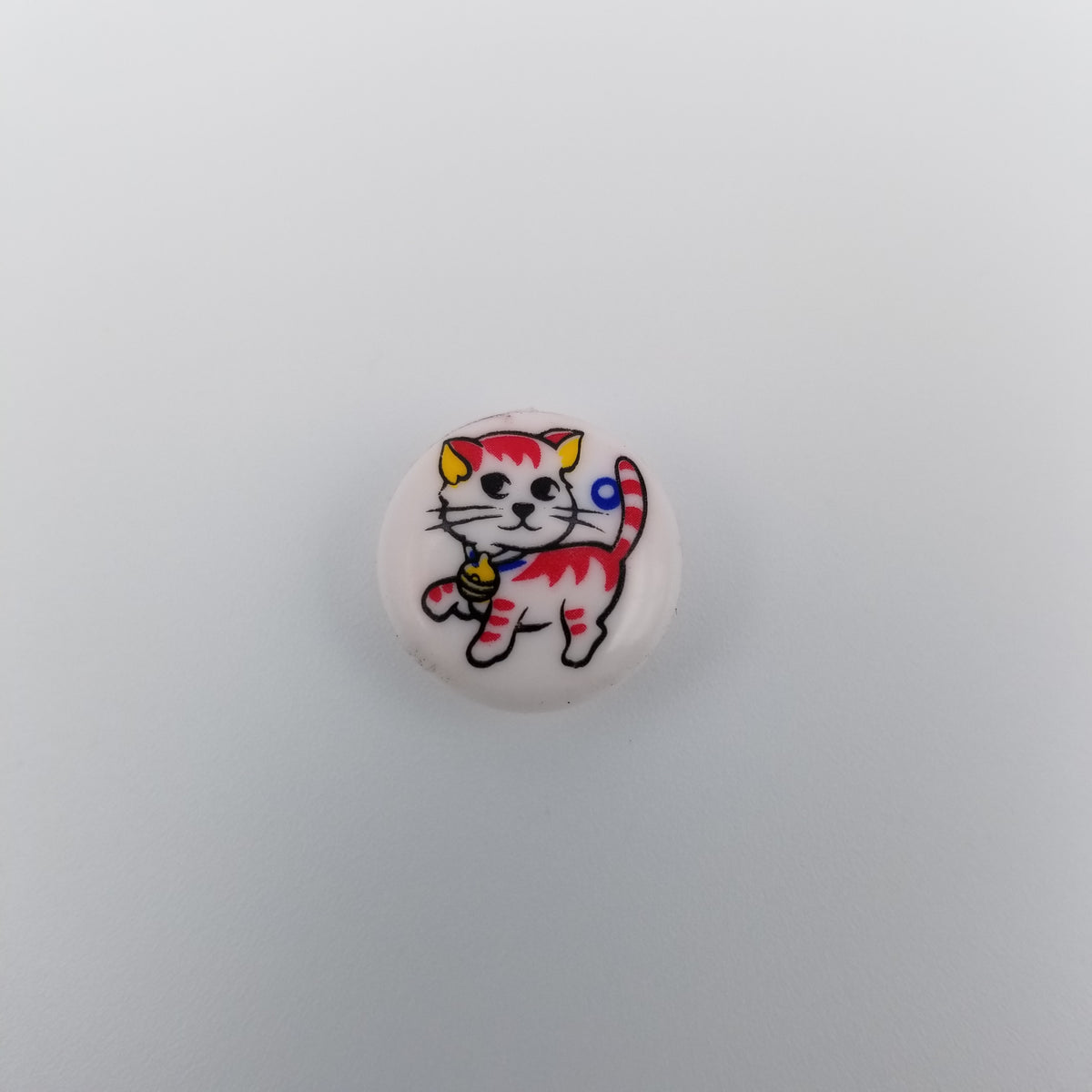 Rounded cat button – Sit 'n Knit